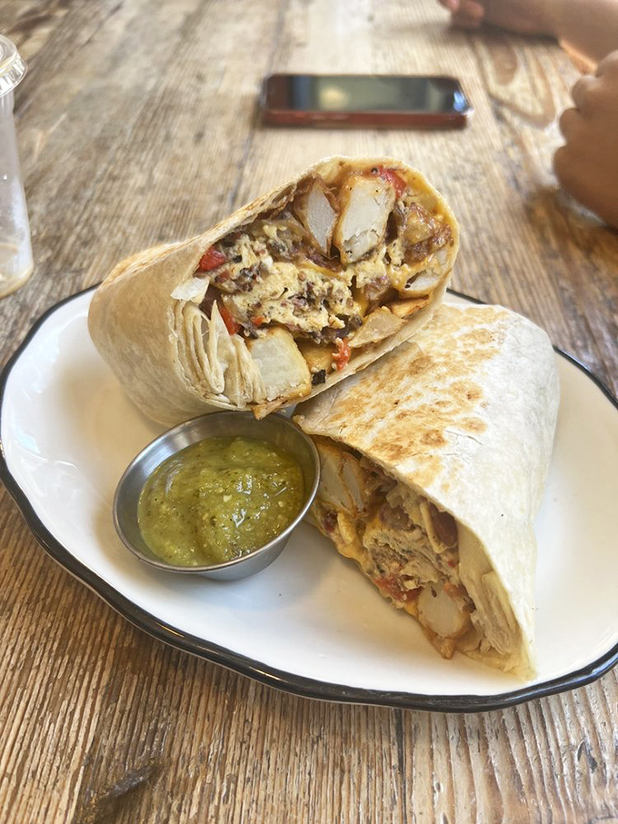 Breakfast burrito perfection – where eggs, potatoes and pastrami come together in a tortilla embrace that makes mornings worthwhile.
