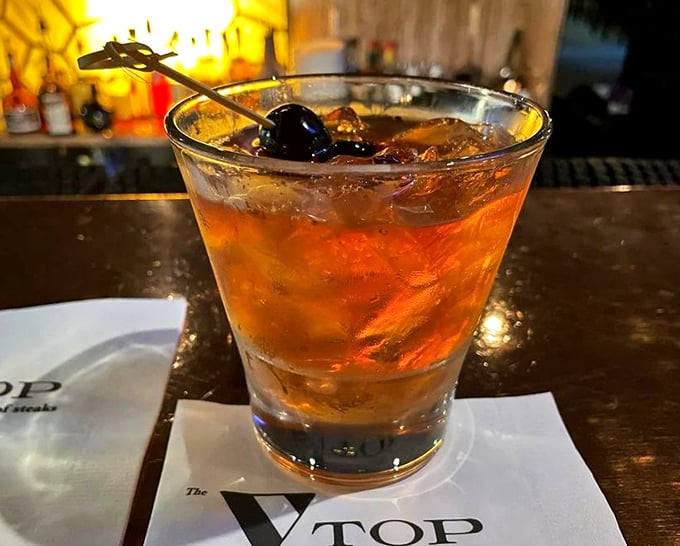 An Old Fashioned that Don Draper would approve of—amber liquid, proper garnish, and just enough ice to keep it civilized.