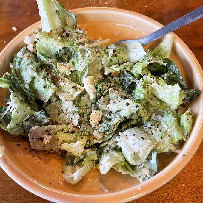 A Caesar salad that actually deserves attention – fresh, crisp romaine with just the right amount of dressing. Even vegetables deserve respect.