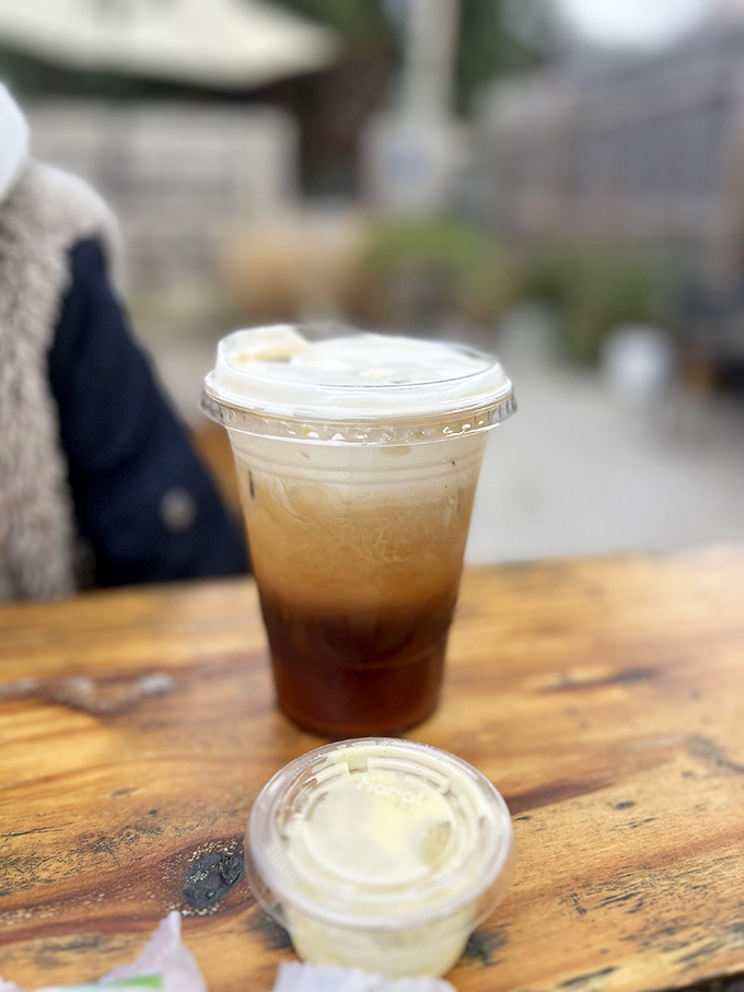 Coffee alchemy at its finest—this layered iced creation might just be the reason Columbus residents bounce through their mornings.