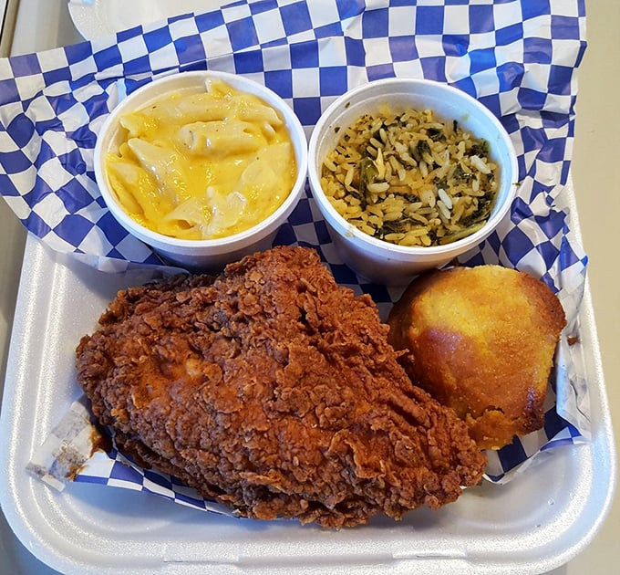 A plate that answers the eternal question: "What if comfort food gave you a warm hug?" Chicken, mac and cheese, and rice—the holy trinity of satisfaction.