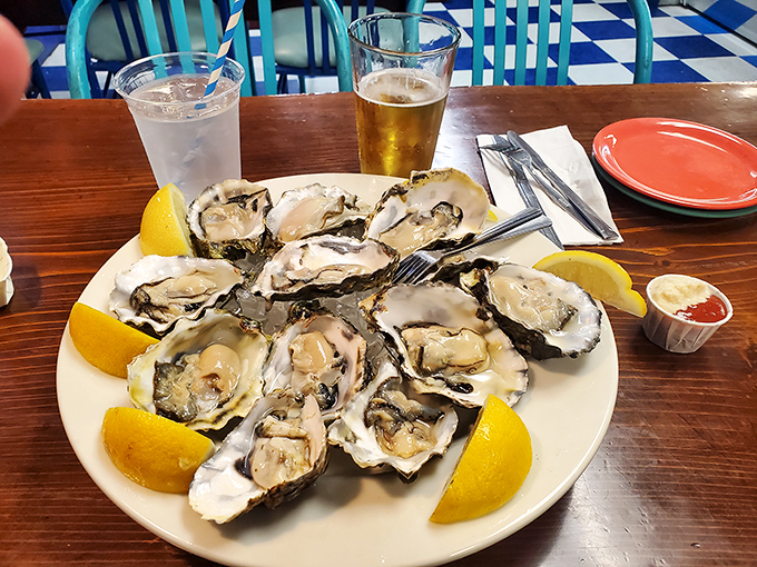 Fresh oysters arranged like a clock face of briny treasures. Each one a perfect little tide pool of flavor, just waiting for a squeeze of lemon.