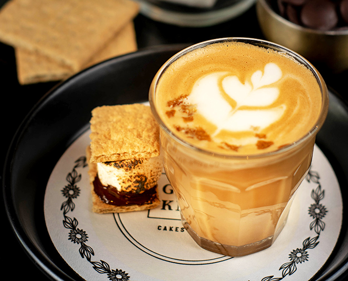 Coffee and s'mores unite in this cappuccino pairing—proof that childhood campfire memories and grown-up caffeine needs can coexist beautifully on one plate.