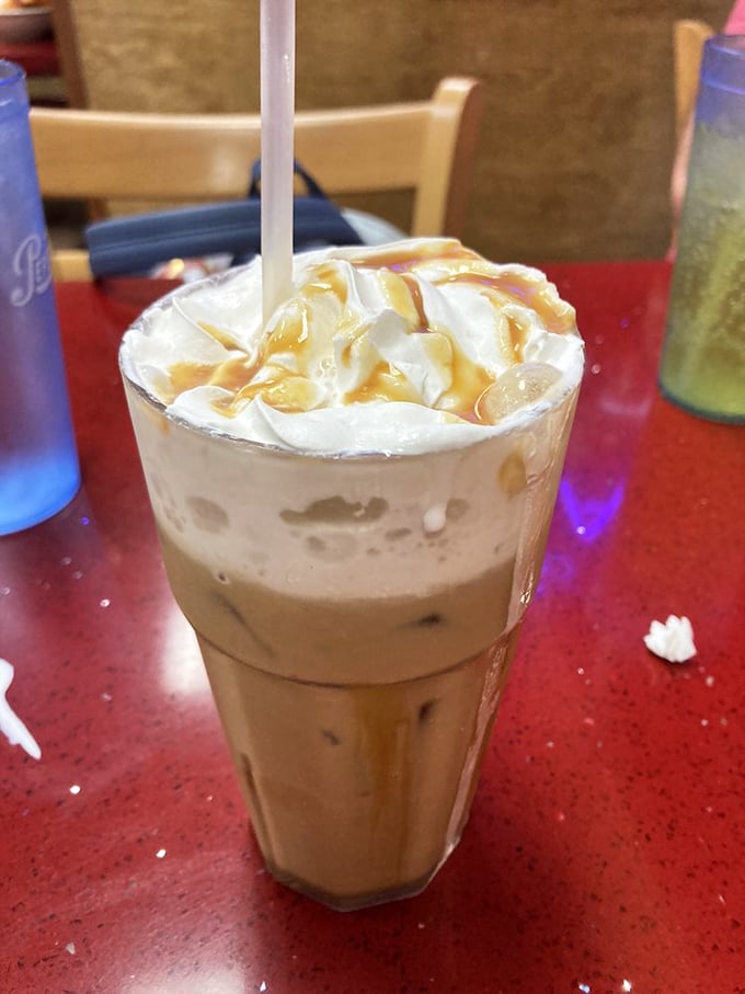Iced coffee with caramel swirls, because sometimes morning needs a sweet caffeinated embrace.