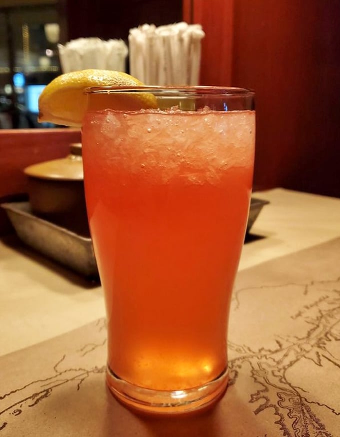 That sunset-colored cherry lemonade isn't just refreshing—it's what summer would look like if you could pour it into a glass.
