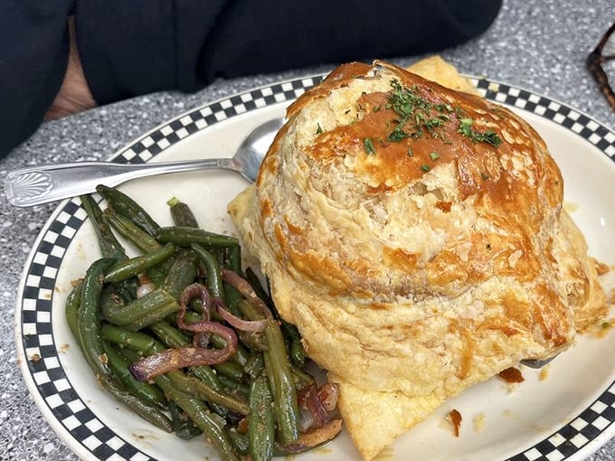 This chicken pot pie isn't just comfort food—it's a warm hug on a plate. That golden crust practically whispers, "Everything's gonna be alright."