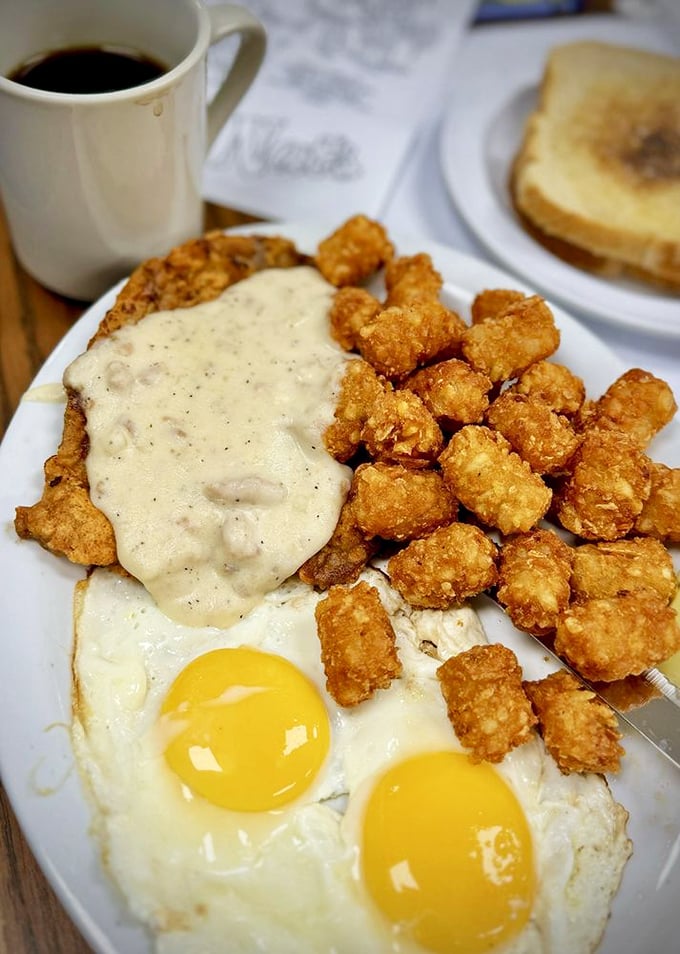 Country-fried steak with gravy and sunny-side-up eggs—because sometimes breakfast should be hearty enough to fuel a cattle drive or just your Tuesday.