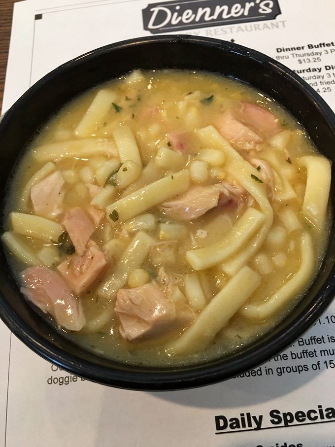 Chicken noodle soup that could cure whatever ails you—thick noodles swimming alongside generous chunks of chicken in a broth that's liquid gold.