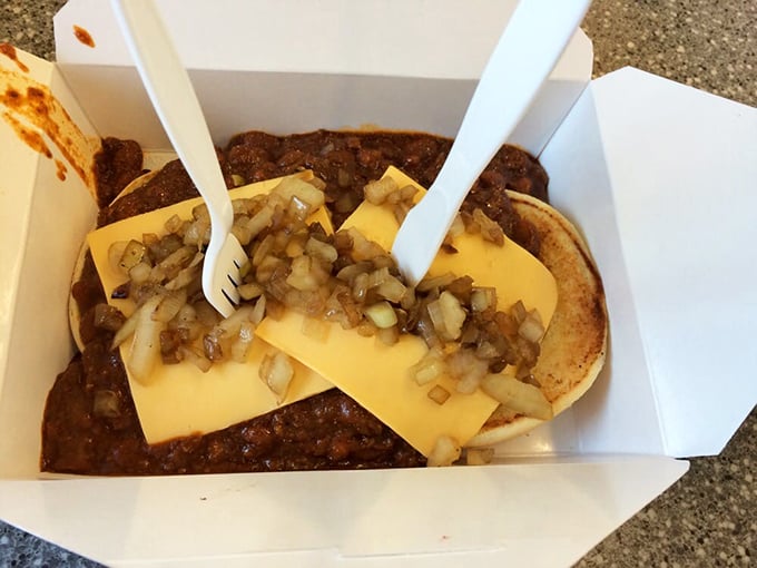 Chili, cheese, and beef living together in perfect harmony—like a delicious rock band where every member is somehow the lead singer.