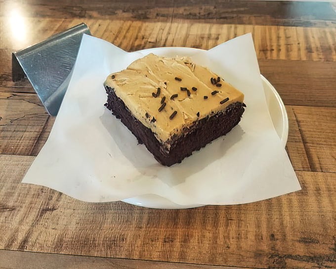 This chocolate brownie isn't having an identity crisis—it knows exactly what it is: the perfect marriage of cake and fudge, topped with buttercream confidence.
