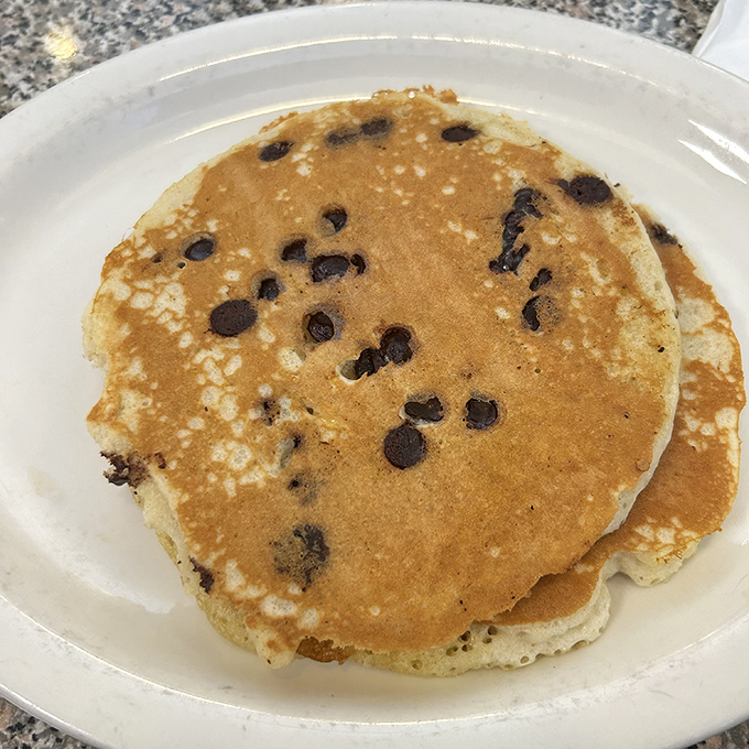 Chocolate chip pancakes that make you feel like you're getting away with something – dessert masquerading as breakfast never looked so good.