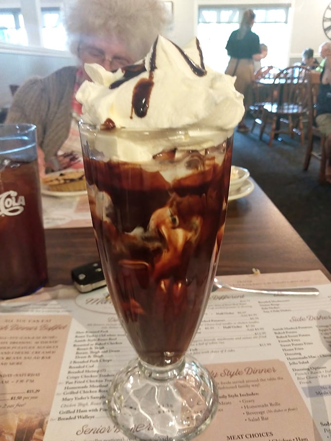 This isn't just a chocolate shake—it's a tower of indulgence that makes you wonder why anyone bothers with those fancy dessert menus.