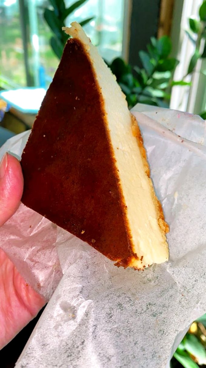 This slice of flan-topped cheesecake doesn't just cross borders—it erases them. Two dessert traditions merging into one perfect bite of cross-cultural deliciousness.