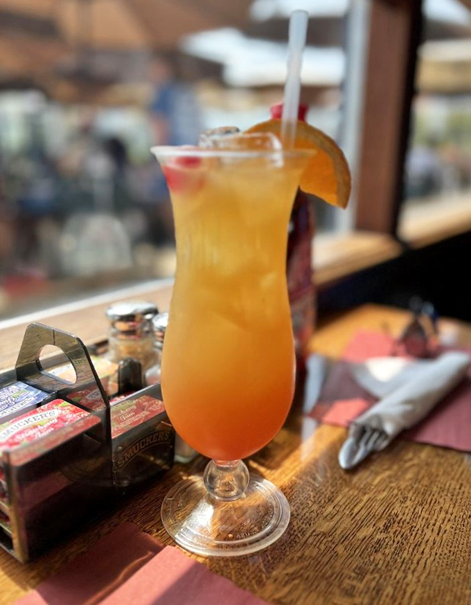 Sunrise in a glass! This tropical cocktail proves that vacation mode officially begins whenever you decide it does.