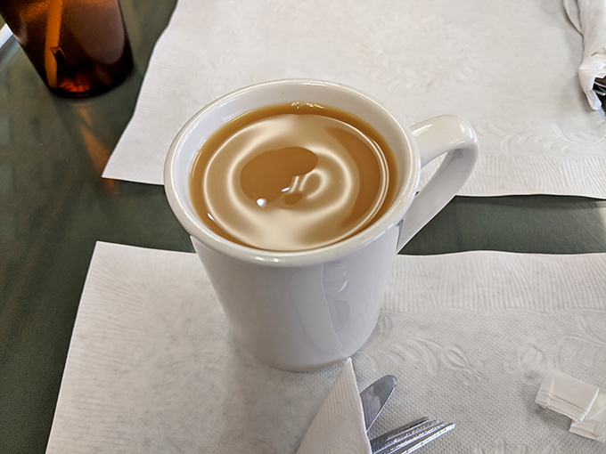 Coffee at Guilday's isn't trying to win barista competitions – it's trying to win your morning. Mission accomplished in this simple white mug.