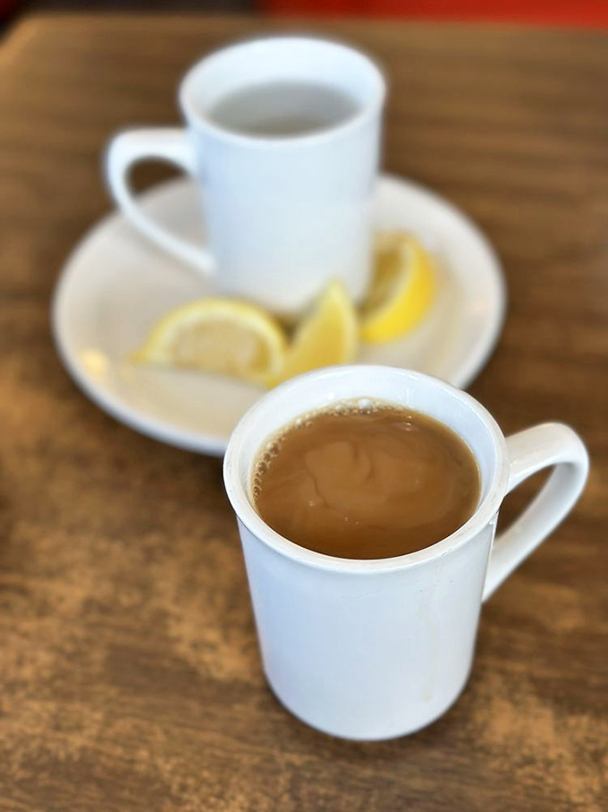 Coffee served with lemon—a European touch in this temple of Americana. Sometimes the simplest pleasures are the most profound.