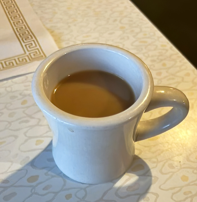 This isn't just coffee—it's a ceramic-cradled lifeline for the morning-impaired, served in a mug that feels like it's been waiting just for you.