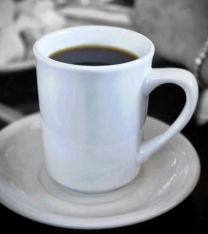 The humble coffee cup—civilization's greatest achievement and the unsung hero of every great breakfast experience.