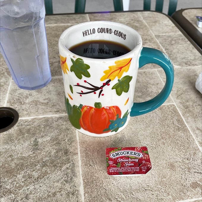 A festive seasonal mug filled with the elixir of morning motivation. Coffee this honest deserves respect—and maybe a second cup.
