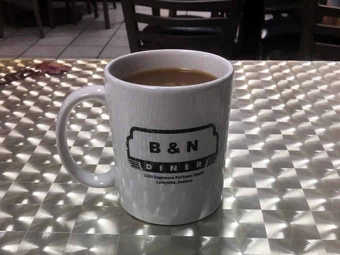 The coffee at B&N comes in mugs that mean business—no delicate handles or artisanal designs, just serious caffeine delivery.
