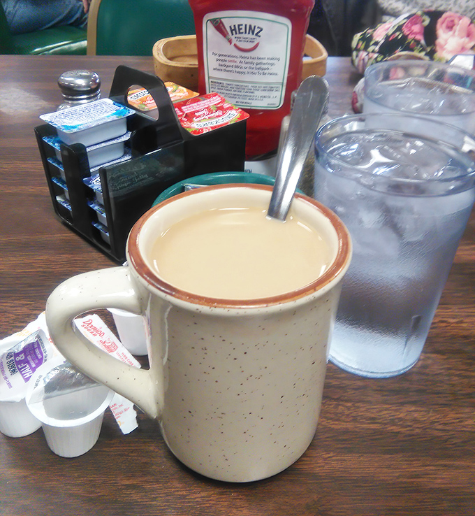 The classic diner coffee mug – sturdy, unpretentious, and promising unlimited refills of liquid motivation to start your day.