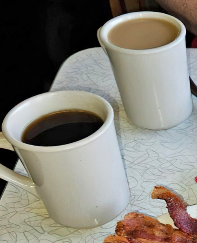 Coffee served in mugs substantial enough to double as hand warmers on chilly Ohio mornings, with bacon playing the perfect supporting role.