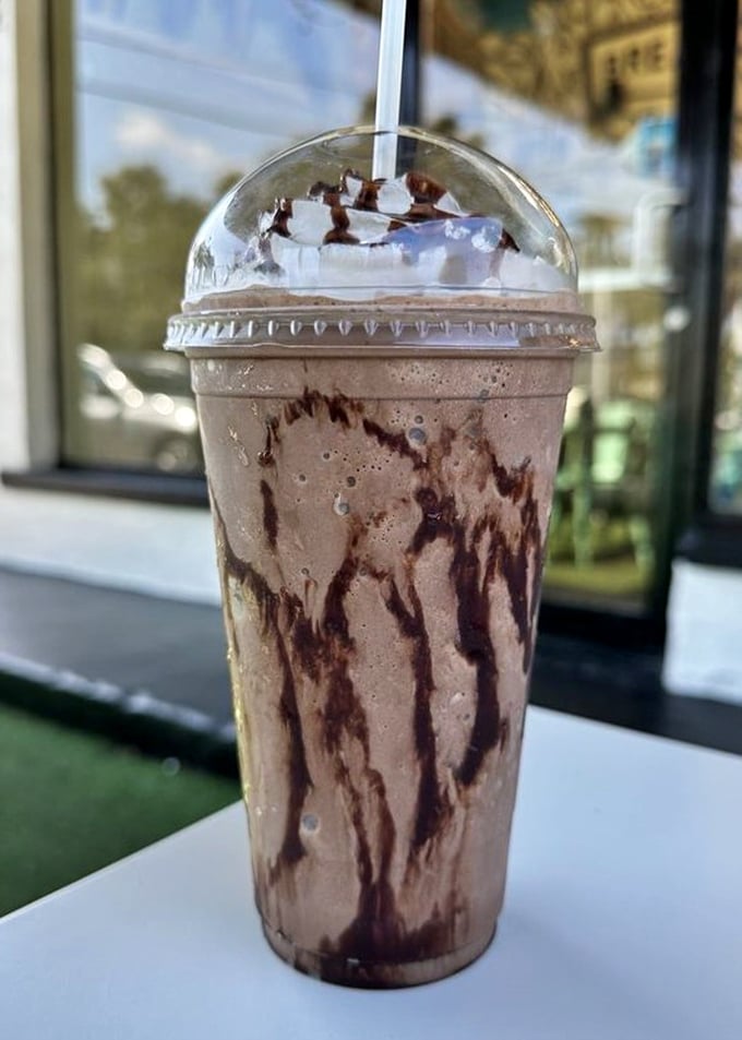Chocolate swirls dancing in a cup like they're auditioning for Fantasia. Florida's heat doesn't stand a chance.