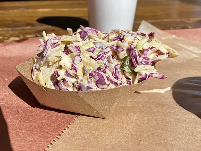 Purple and white cabbage transformed into creamy, crunchy coleslaw—the perfect cool counterpoint to all that smoky meat.