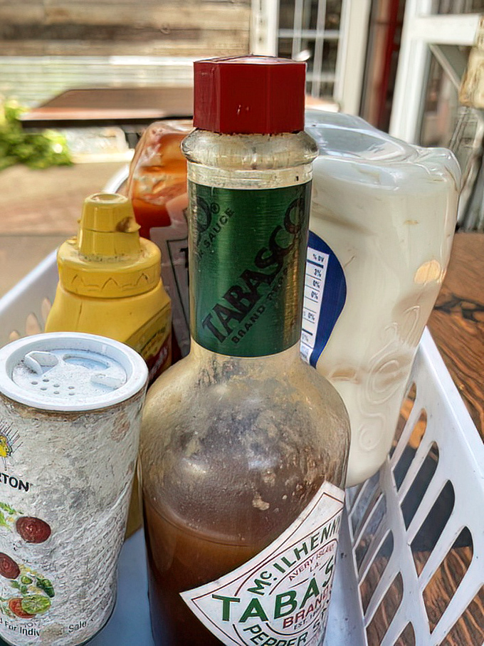 The condiment caddy—where Tabasco meets ketchup in the ultimate flavor support group. These bottles have seen things, man.