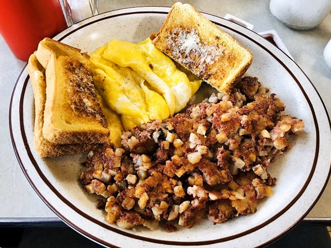 This omelet and hash brown plate isn't just breakfast—it's morning therapy served on classic diner china.