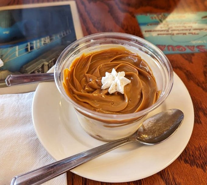 Cuatro Leches dessert swirls with caramel artistry—proof that sometimes the best relationships involve multiple layers and just the right amount of sweetness.