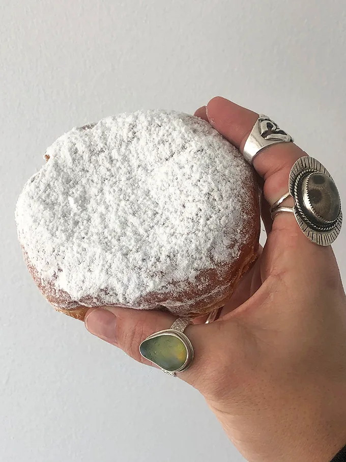 Custard-filled paczki that prove some traditions are worth crossing oceans and decades to preserve beautifully.