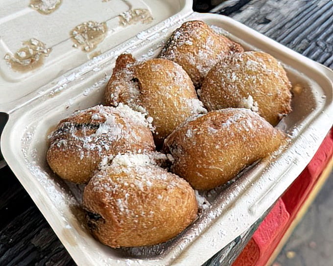 Deep-fried Oreos: Because sometimes cookies need to dress up in their formal wear—a golden, crispy batter dusted with powdered sugar.