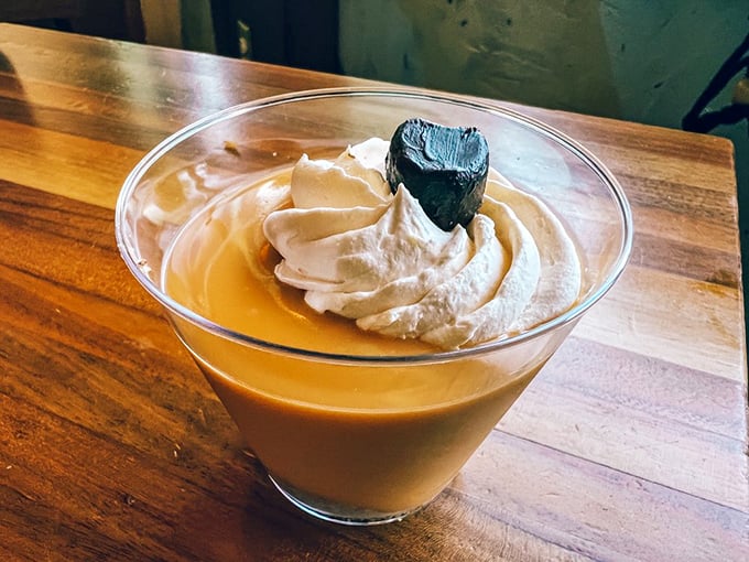 Key lime pudding with a chocolate heart – because after conquering a seafood mountain, your sweet tooth deserves its own victory dance.