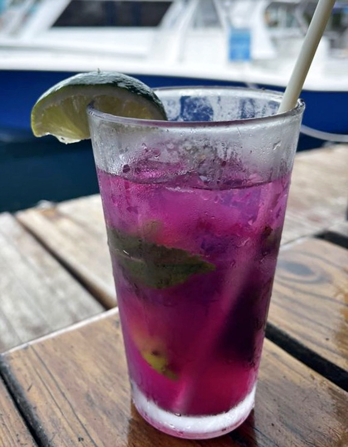 This isn't just a pretty purple drink—it's vacation in a glass, complete with lime, mint, and the promise of an afternoon nap.