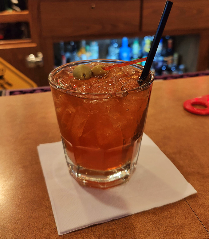 The unofficial state cocktail of Wisconsin—a Brandy Old Fashioned Sweet, muddled with fruit and served with those essential red cocktail cherries.