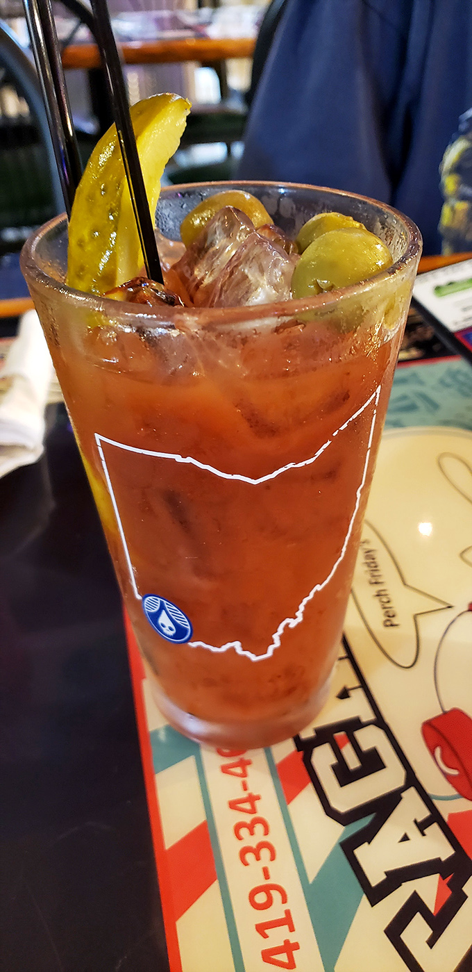 This isn't just a Bloody Mary—it's a liquid meal with enough garnish to qualify as an appetizer. The perfect riverside companion.
