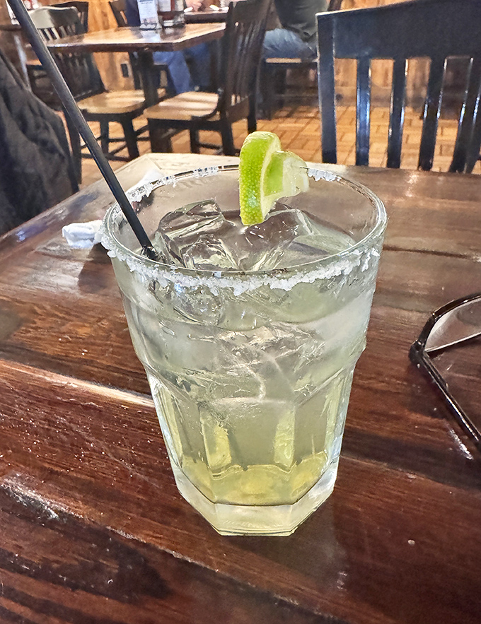 A salt-rimmed margarita with lime—the perfect coastal companion. Because nothing complements seafood quite like a properly made cocktail.