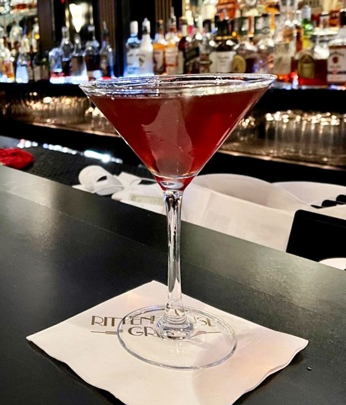 Ruby-red and glistening like liquid jewelry, this cocktail isn't just mixed—it's crafted. The perfect prelude to prime rib perfection.
