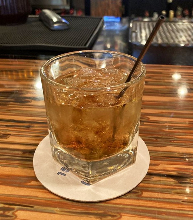A properly poured whiskey on the rocks – civilization's answer to "what should I drink while contemplating life's big questions or Thursday's dinner special?"