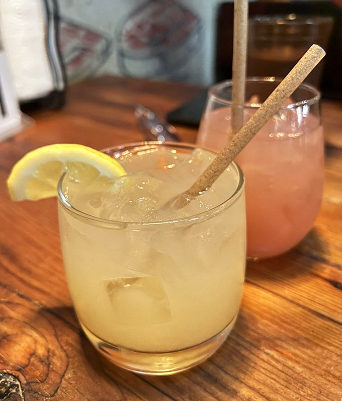 Craft cocktails and house-made lemonade served in unpretentious glassware—because even your beverages should keep it real at a barbecue joint.