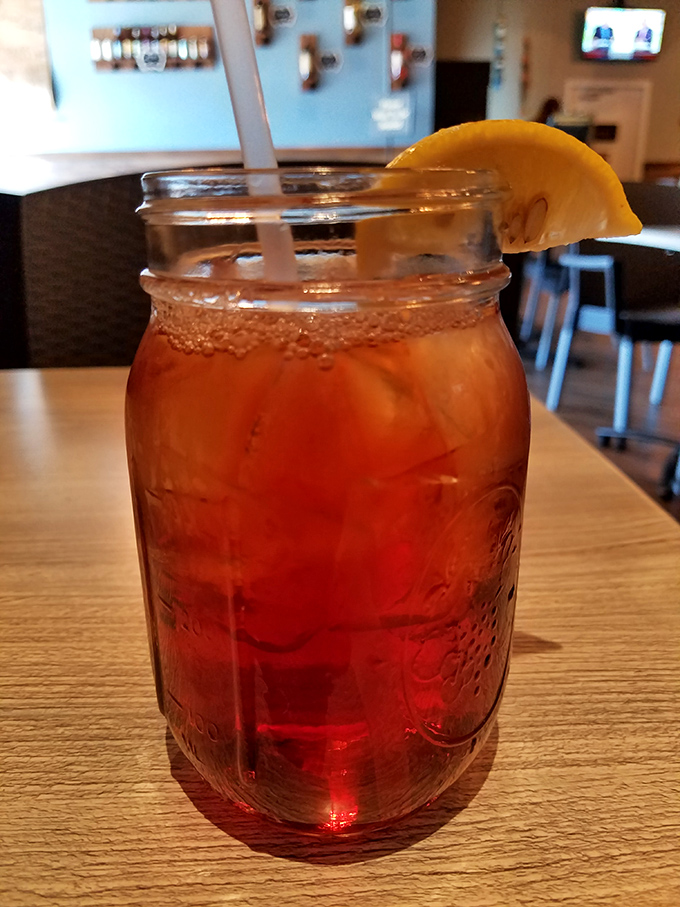 Sweet tea served in a mason jar—because sometimes the vessel is as important as what's inside it. Southern hospitality in liquid form.