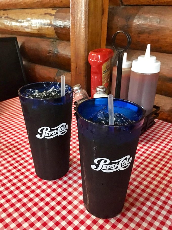 Those blue Pepsi glasses aren't retro by design—they're just what's always worked, alongside squeeze bottles of sauce standing ready for duty.