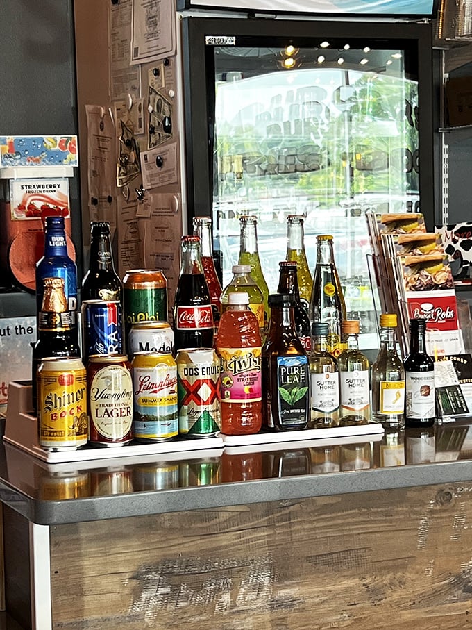 The drink selection rivals my aunt's liquor cabinet after she discovered Costco. Mexican Coke with real sugar? That's the proper accompaniment to burger perfection.