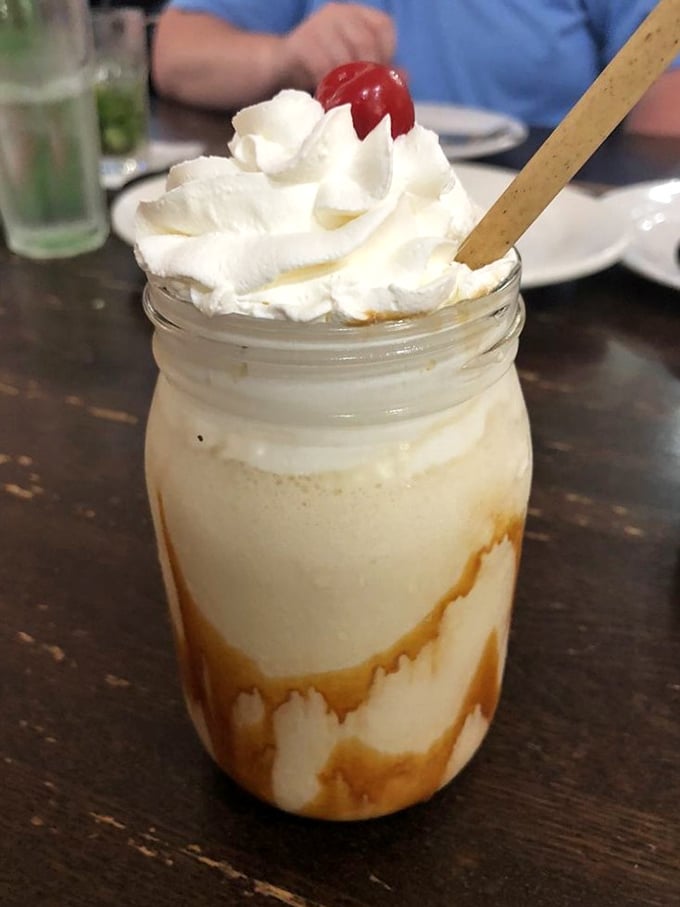 This isn't just a milkshake—it's dessert with a straw. Dulce de leche swirls, whipped cream, and a cherry on top scream "vacation mode: activated."