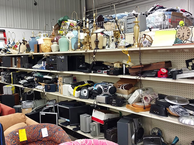 The electronics corner—a technological time capsule where yesterday's cutting-edge gadgets find second lives. Someone's forgotten stereo becomes another's vintage score.