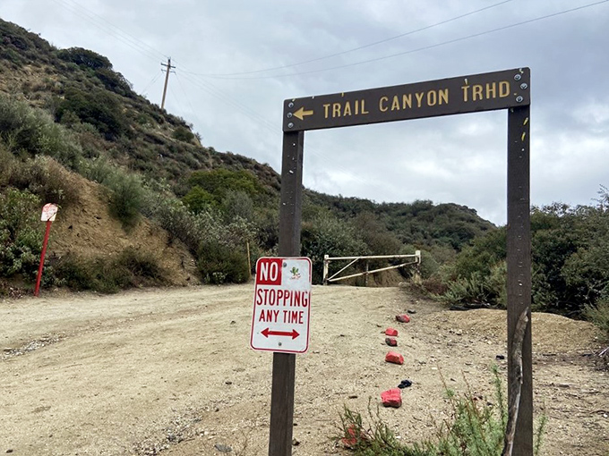 The gateway to adventure – this unassuming entrance marks where city life ends and wilderness begins.