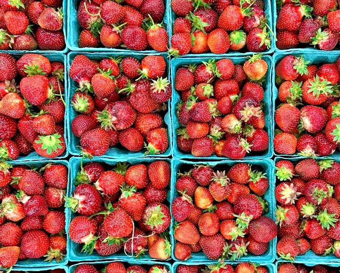 Nature's candy store: strawberries so perfectly red they look Photoshopped. The kind of produce that makes you temporarily believe you'll start eating healthy.