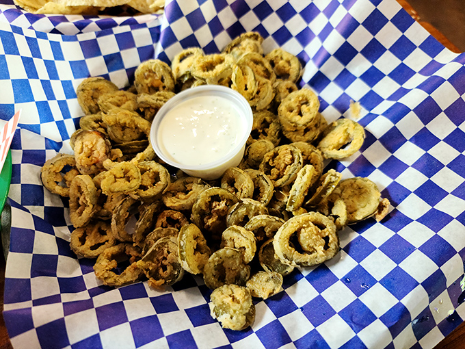 These golden-fried jalapeños aren't just appetizers—they're tiny crispy vessels of Texas pride with a kick that demands attention.
