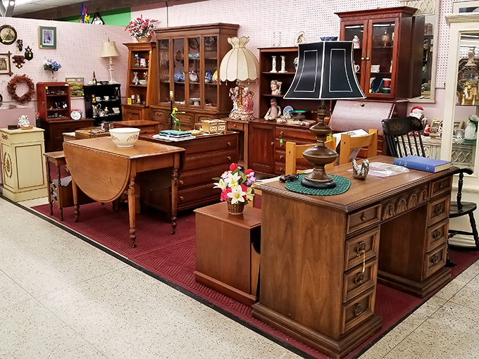 This elegant furniture display showcases the kind of solid wood craftsmanship that makes IKEA instructions seem like a cruel joke.
